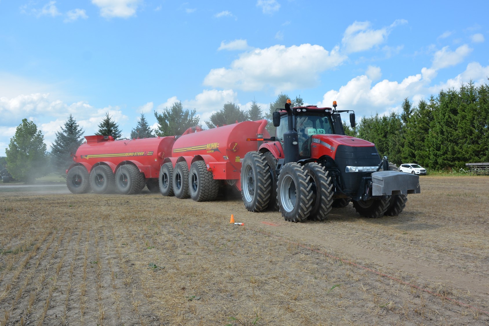 Unit E12: CaseIH Magnum 380+ Nuhn 15000 gal Quad Steer Articulated ...