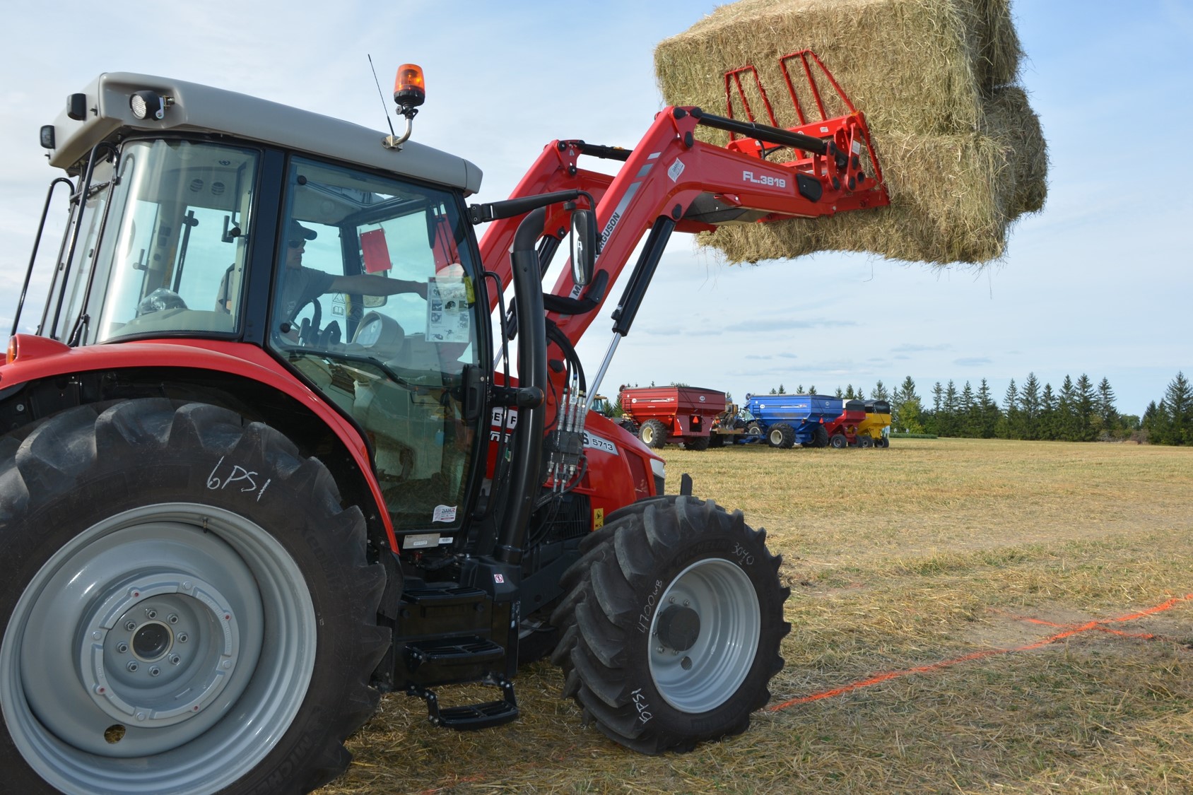 Unit D47: Massy Ferguson 5713S Row Crop Loader Tractor – Field Crop News
